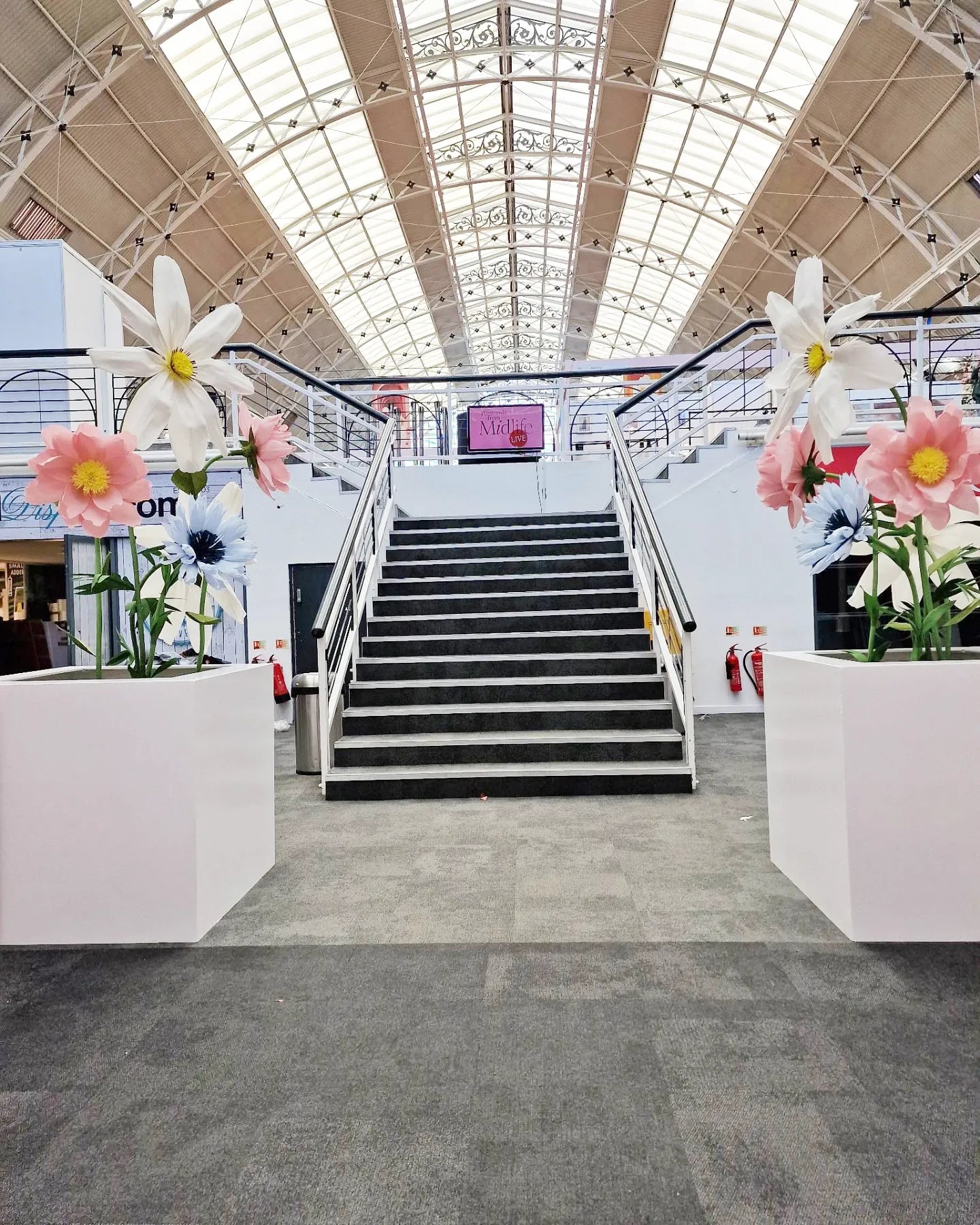 Postcards from Midlife Live! – Grand Flora